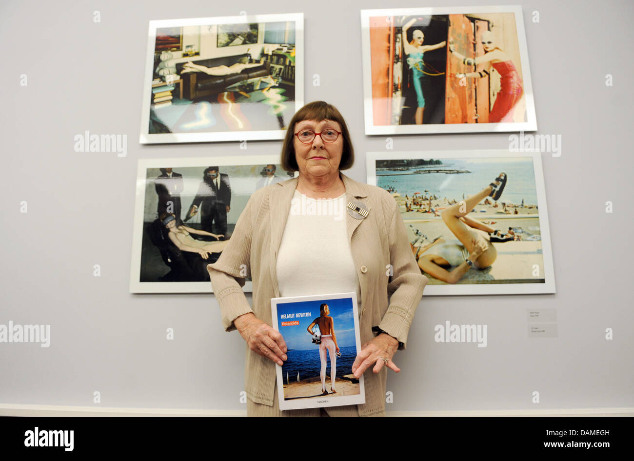 June Newton, the widow of Helmut Newton, poses in front of enlarged ...