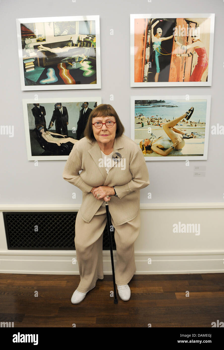 June Newton, the widow of Helmut Newton, poses in front of enlarged ...