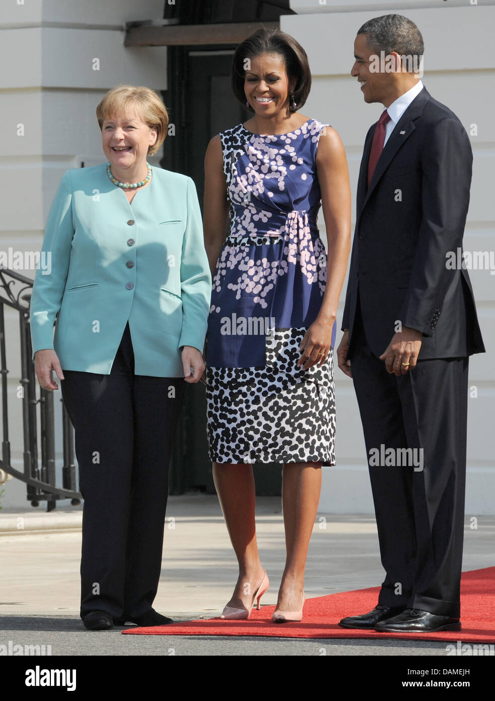 US President Barack Obama and his wife Michelle receive German ...