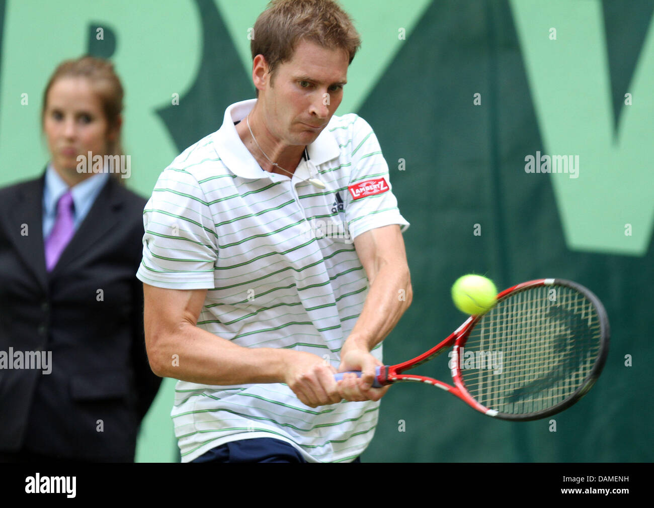 German tennis player Florian Mayer hits the ball during the round of 16 ...