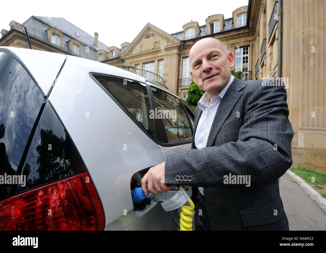 Baden-Wuerttemberg's Transport Minister Winfried Hermann poses with a ...