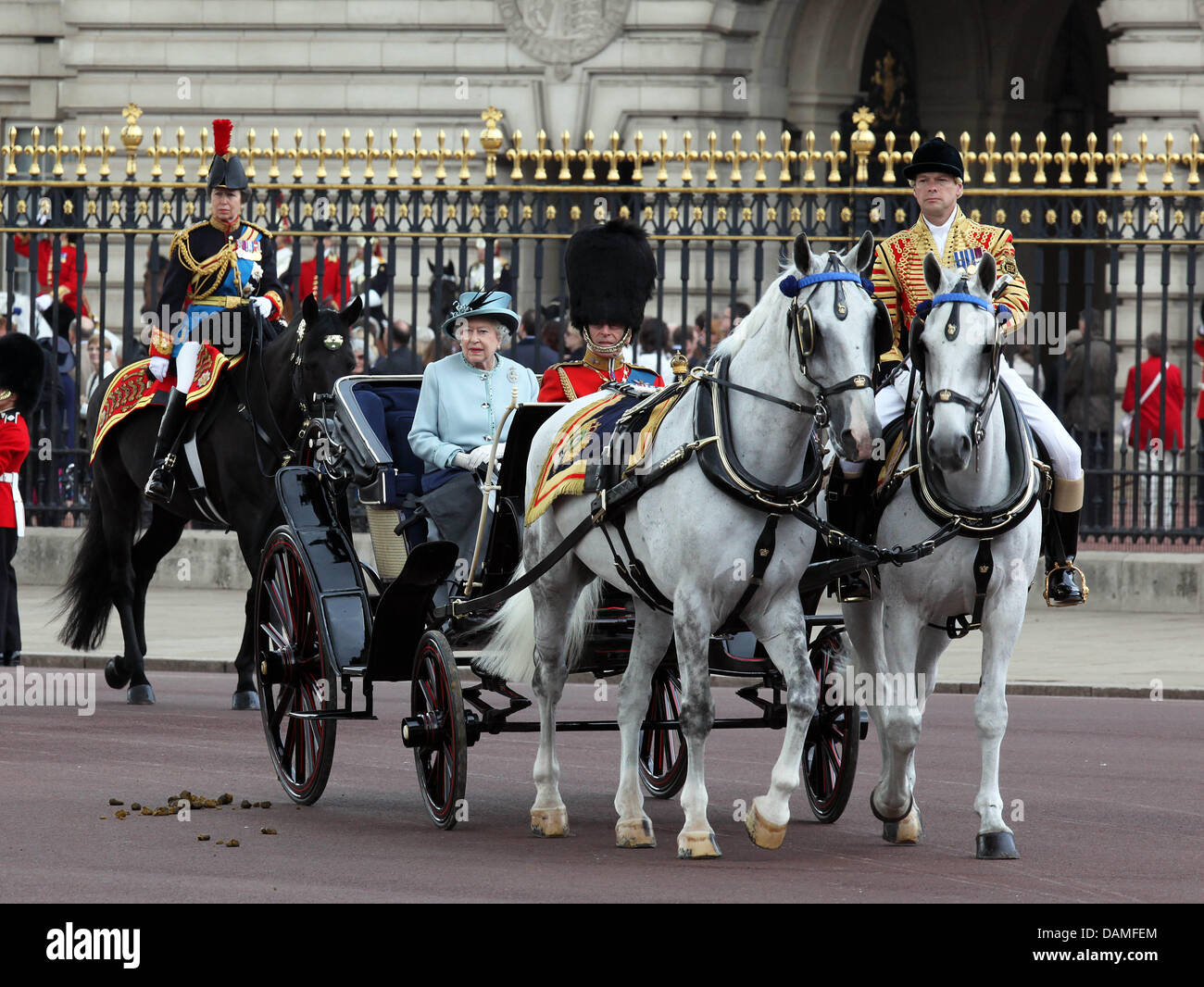 Britain's Anne The Princess Royal rides a horse behind the carriage ...