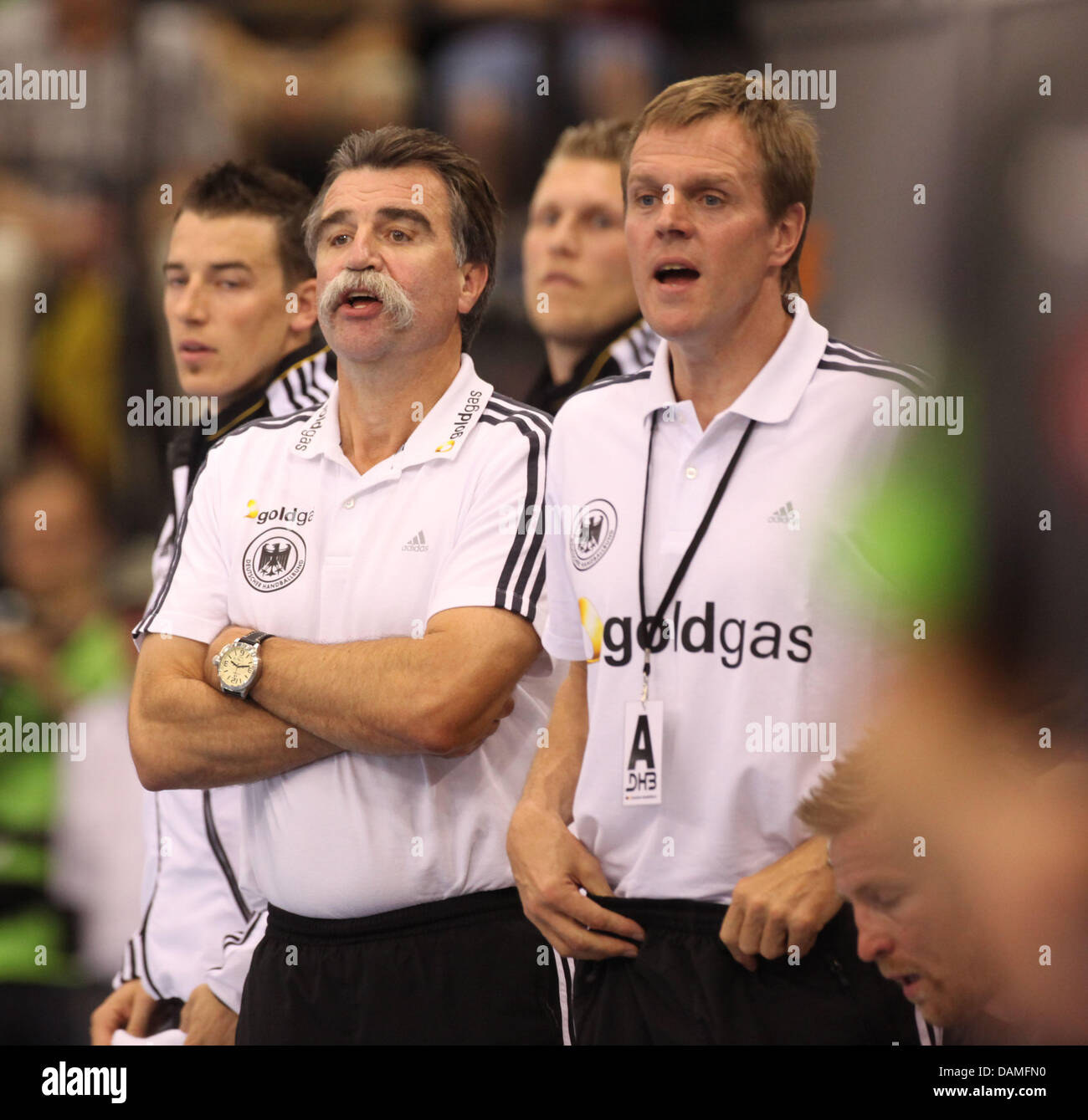 German coach Heiner Brand (L) during the European men's handball ...