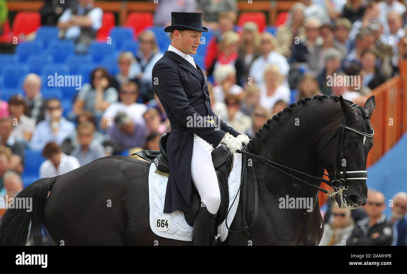 Matthias Alexander Rath rides Totilas at the German Dressage ...