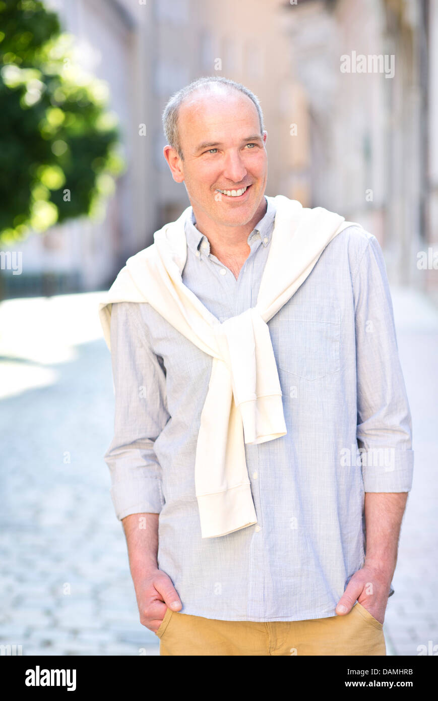 Germany, Bavaria, Mature man looking away, smiling Stock Photo - Alamy Germany, Bavaria, Mature man looking away, smiling Stock Photo - Alamy