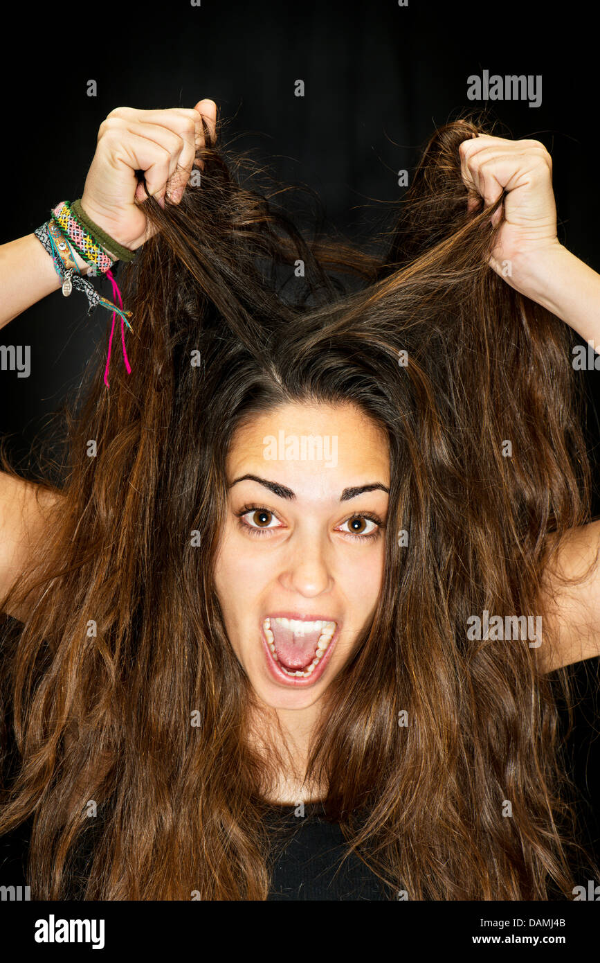 Women pulling hair hi-res stock photography and images - Alamy