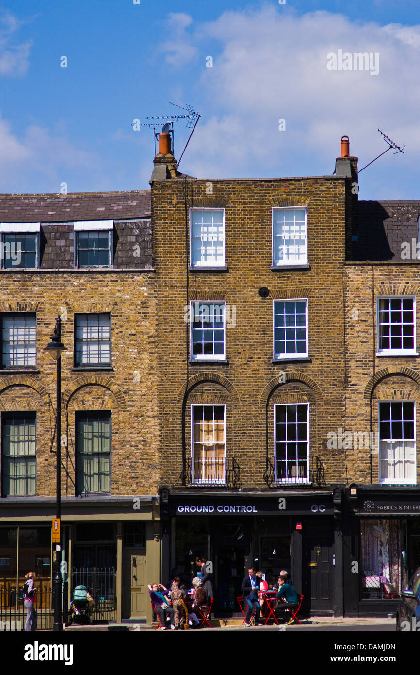 Boutique shops part of a Georgian terrace on Amwell street, London ...