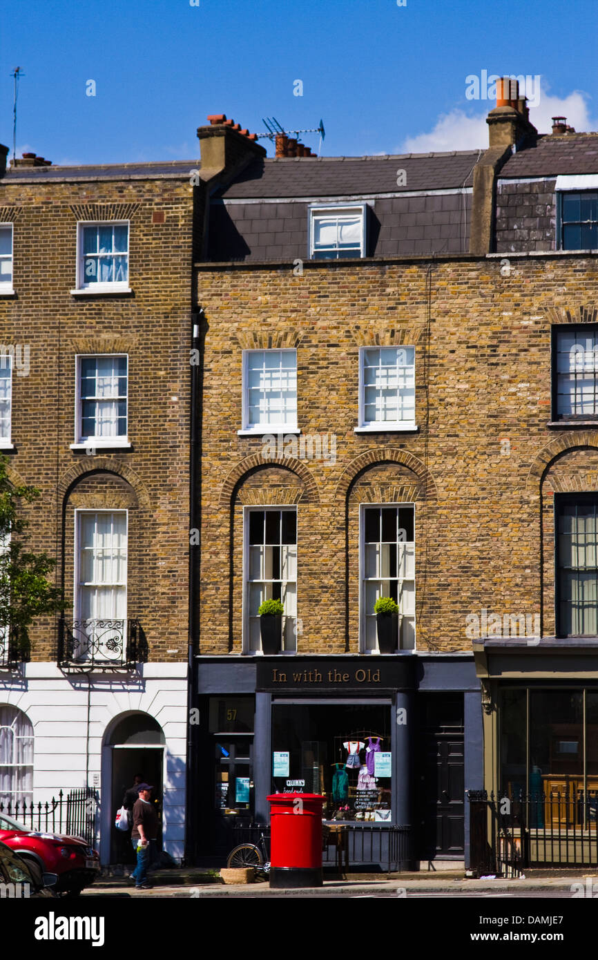 Boutique shops part of a Georgian terrace on Amwell street, London ...