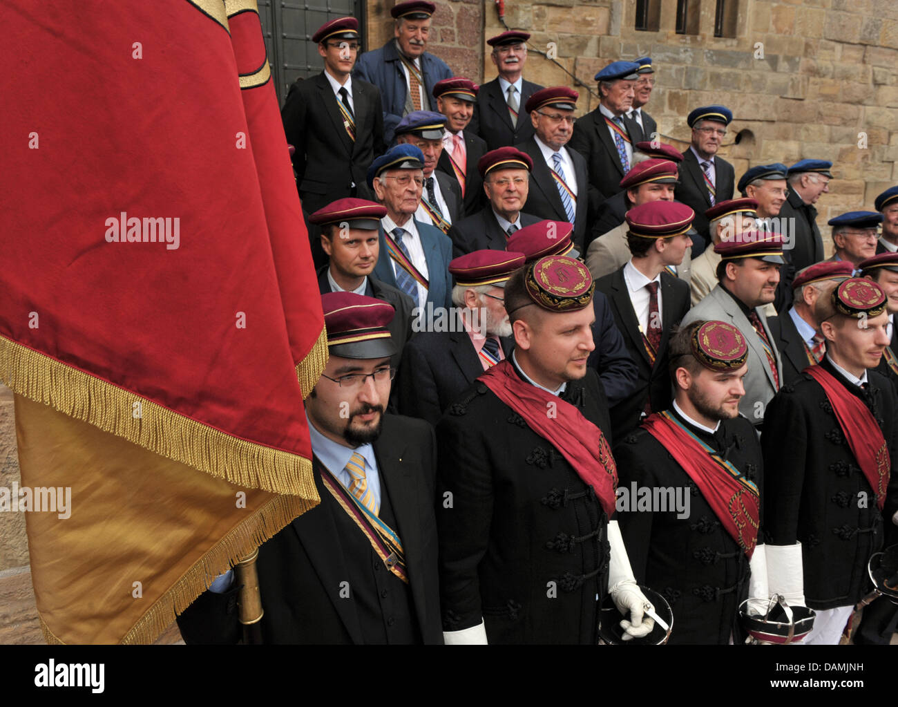Students in uniform are picture during the ceremonioal act of the ...