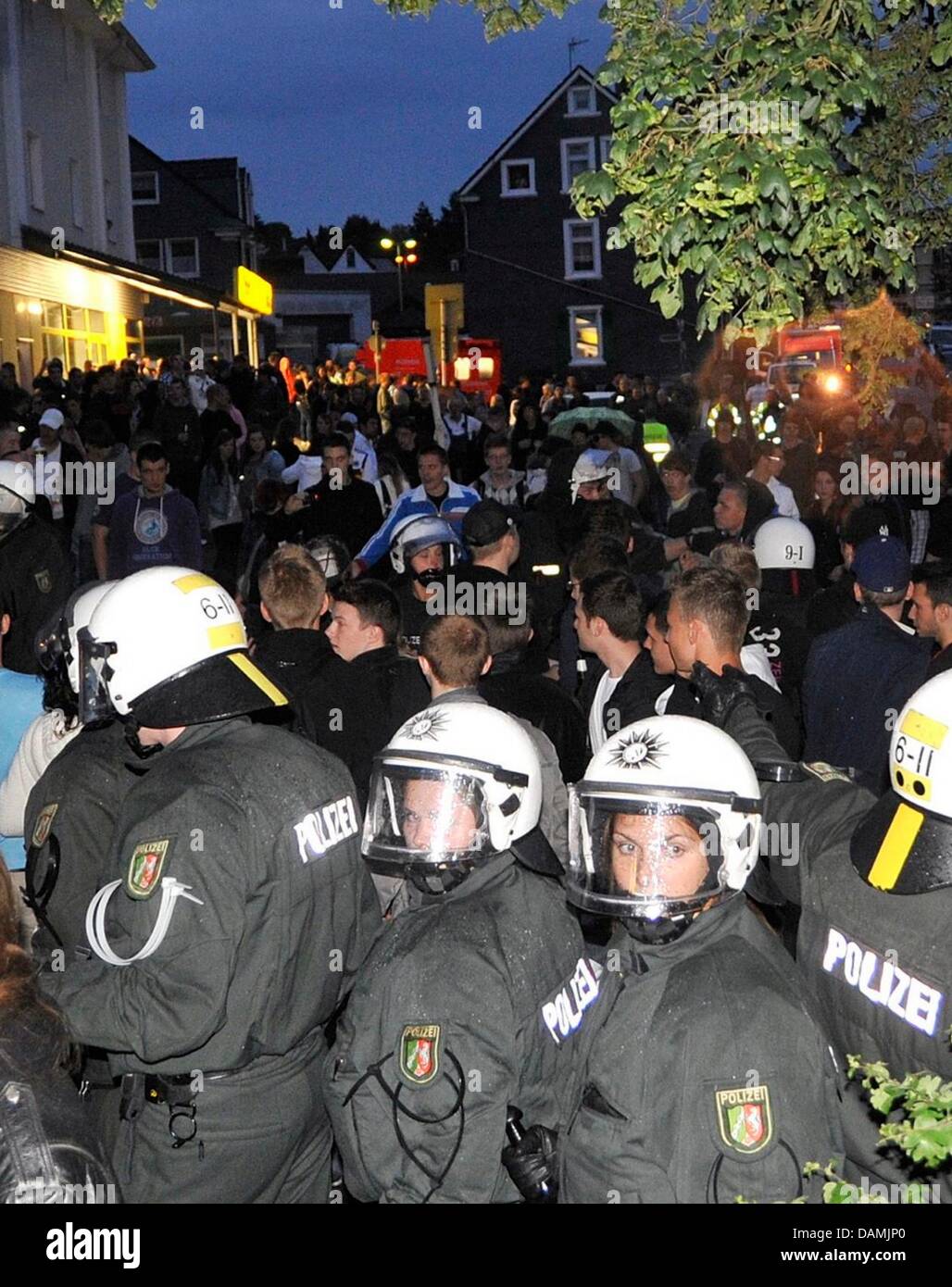 The police end a street party with estimately 800 participants which ...