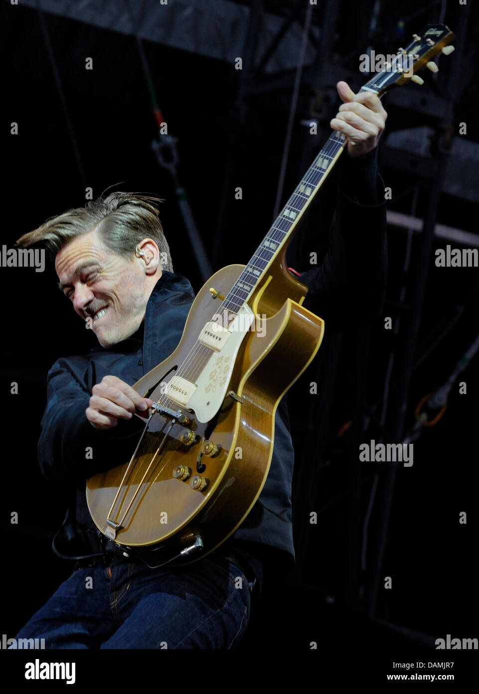 US singer Bryan Adams performs on stage during an open air concert ...