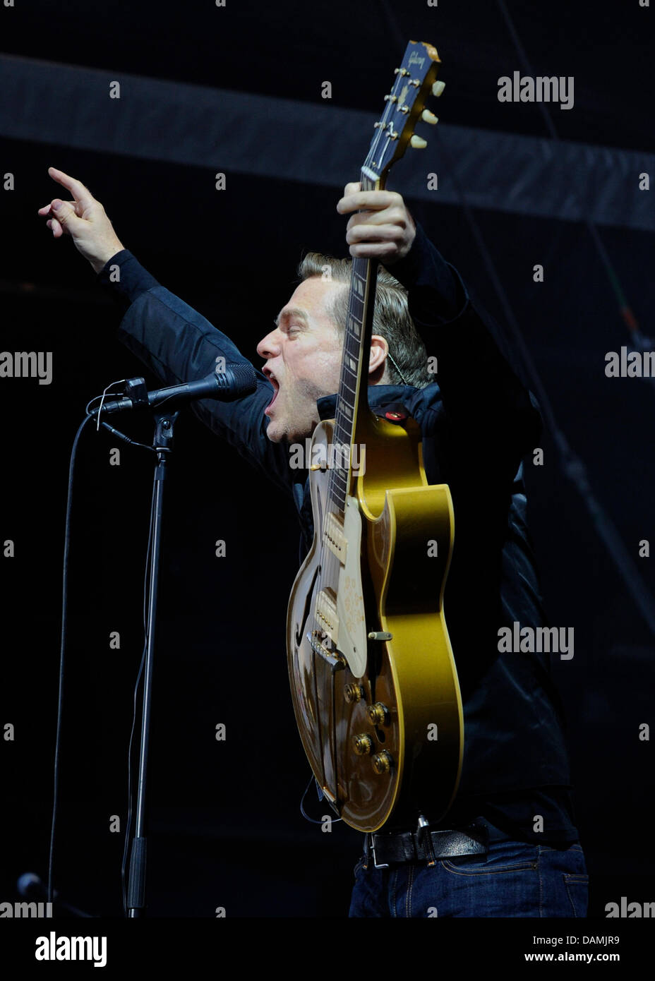 US singer Bryan Adams performs on stage during an open air concert ...