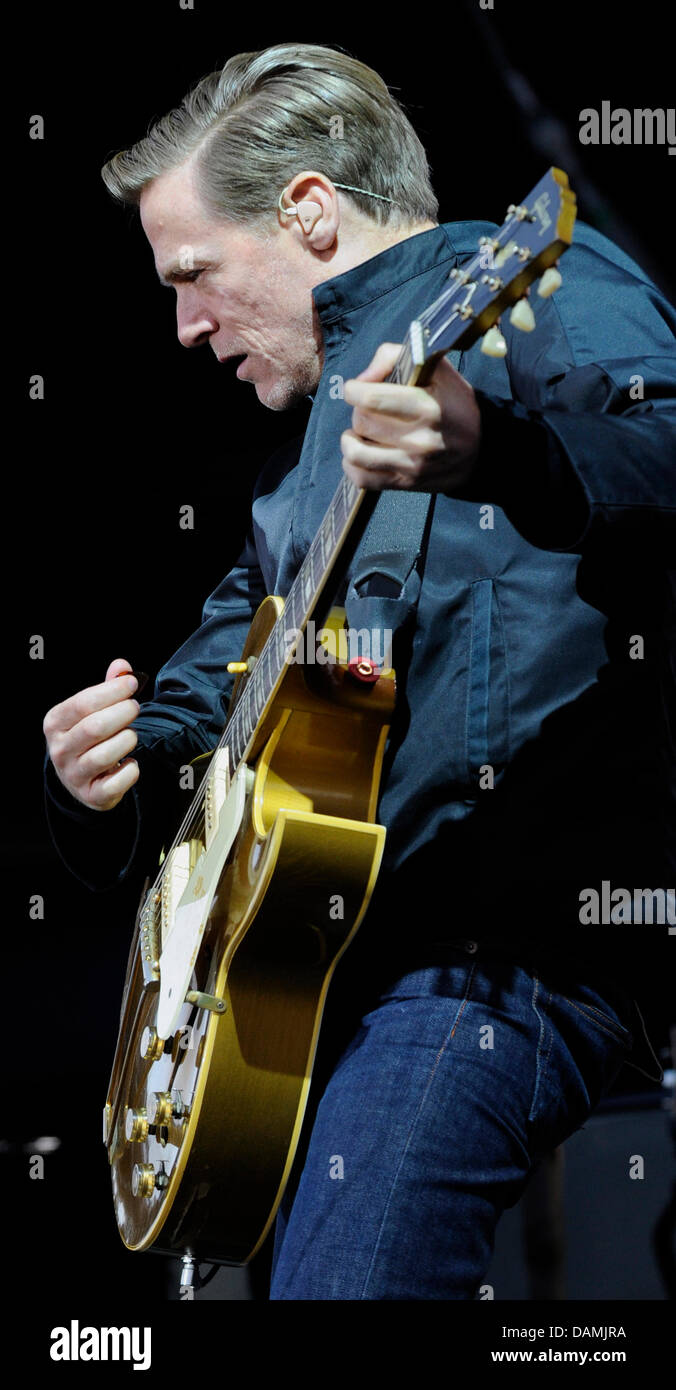 US singer Bryan Adams performs on stage during an open air concert ...