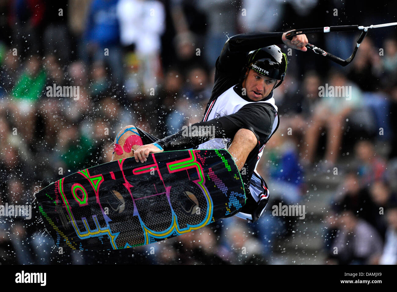 US wakeboarder Shawn Watson jumps over a ramp during the wakeboard ...