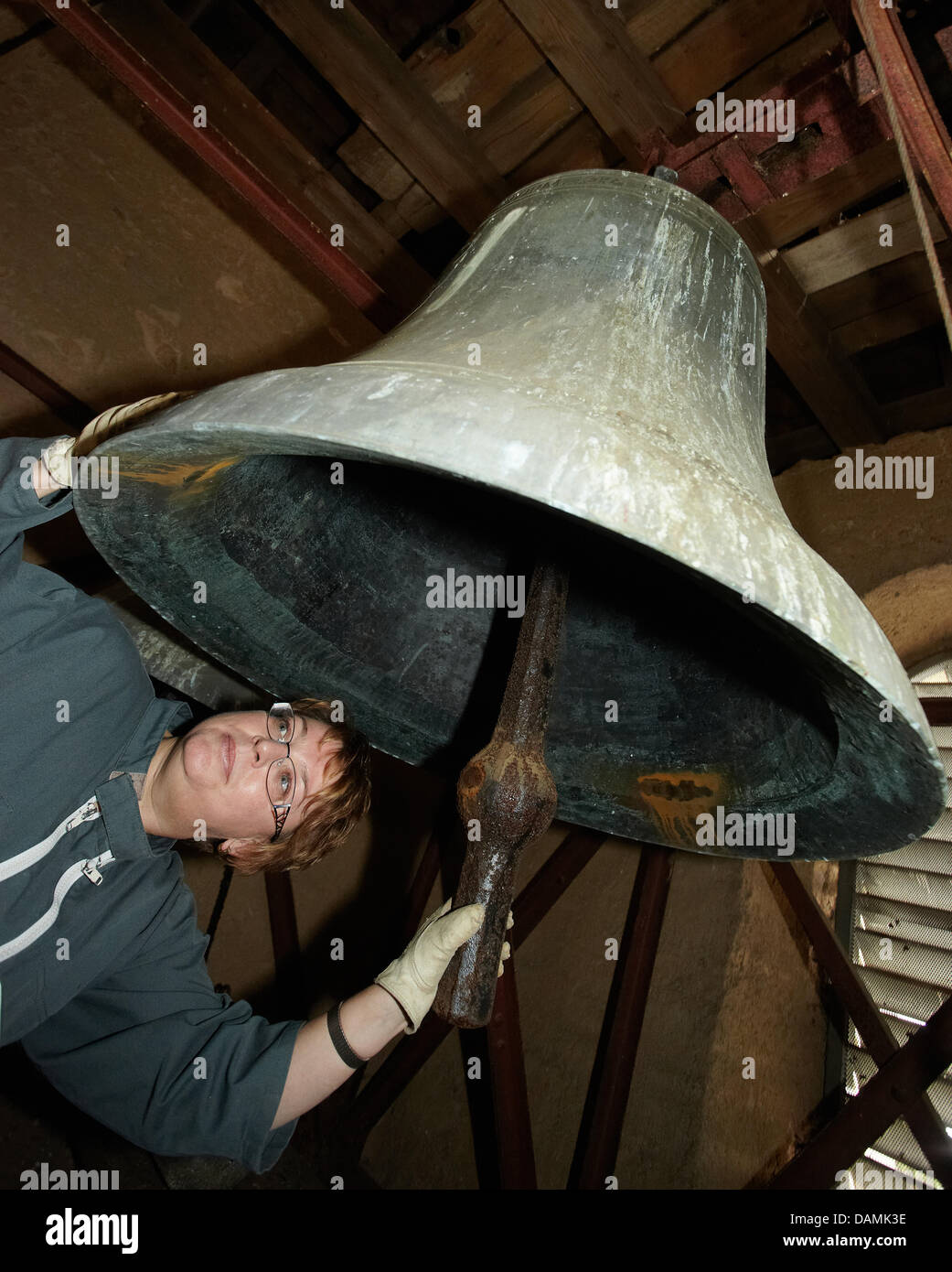 Bells' specialist Birgit Mueller checks the bell at the steeple of the ...