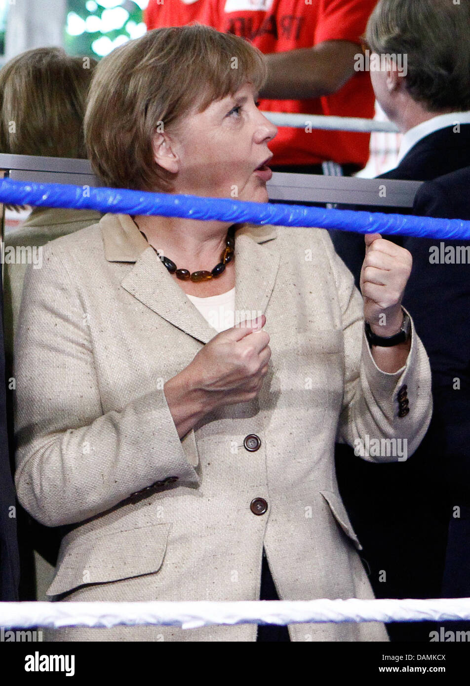 German Chancellor Angela Merkel watches a boxing fight at a youth ...