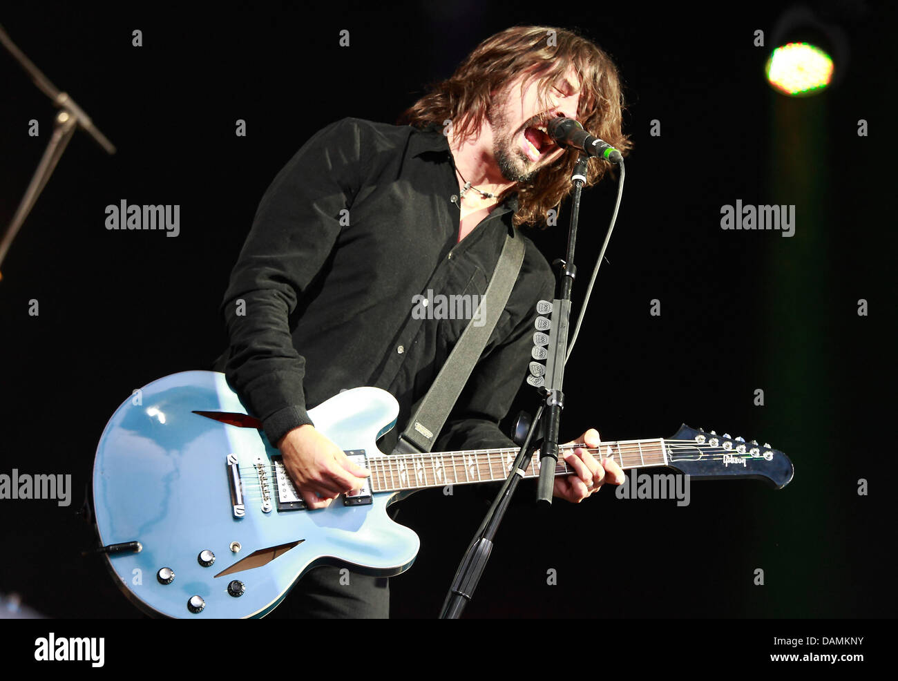 Dave Grohl, singer of the US rock band 'Foo Fighters', plays on stage ...
