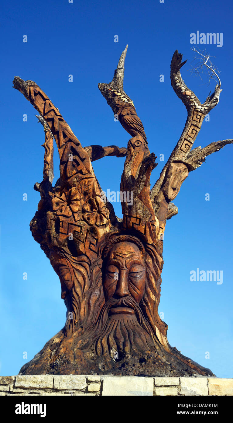 carved tree in Matala, famous beach hippie ressort in 1970-1990. South ...
