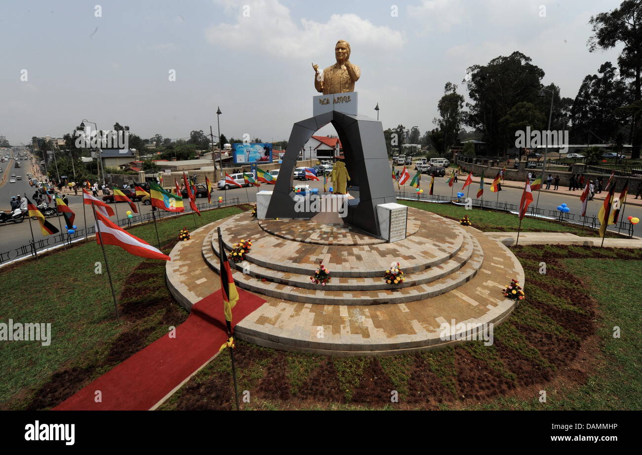 Flowers lay in front of the 'Karl's Monument' honoring 'People for ...