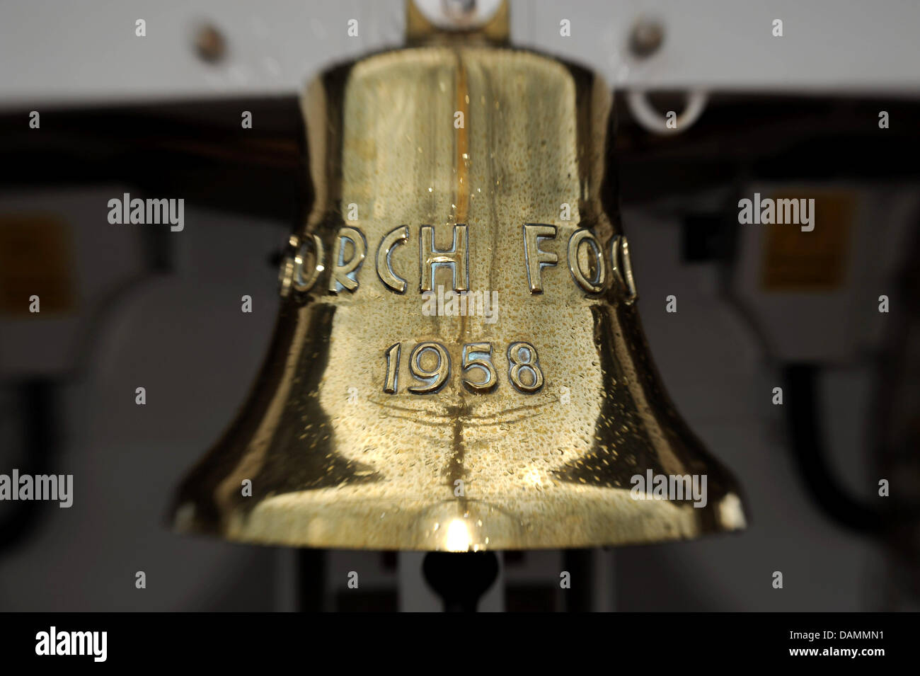 The ship's bell hangs on-board of the German Navy school ship Gorch ...