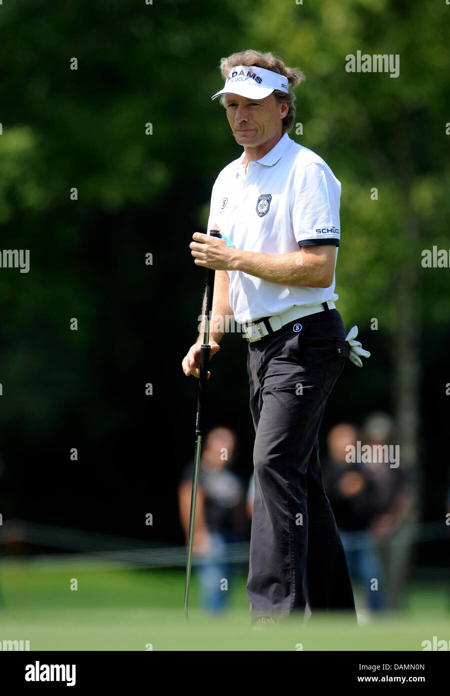 German professional golfer Bernhard Langer looks at where his ball ...