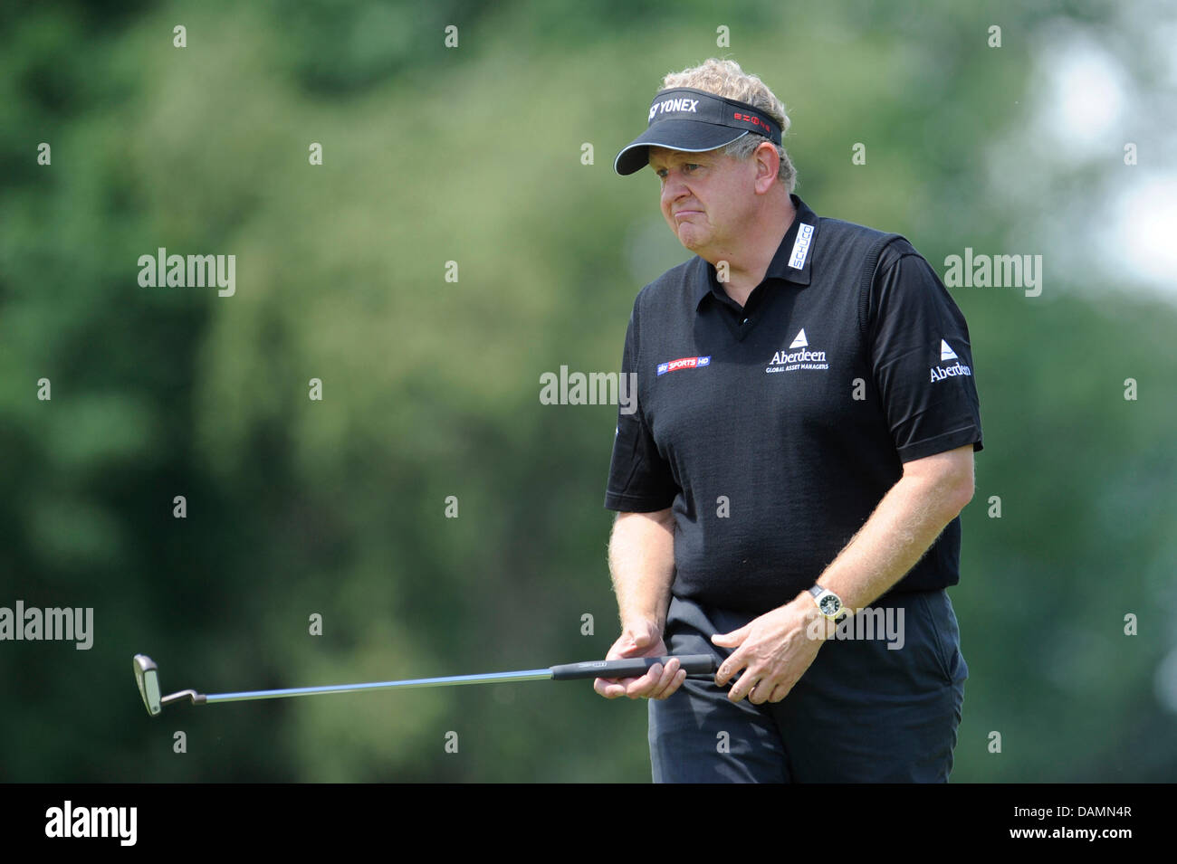 Scottish professional golfer Colin Montgomerie hits the ball at the BMW ...