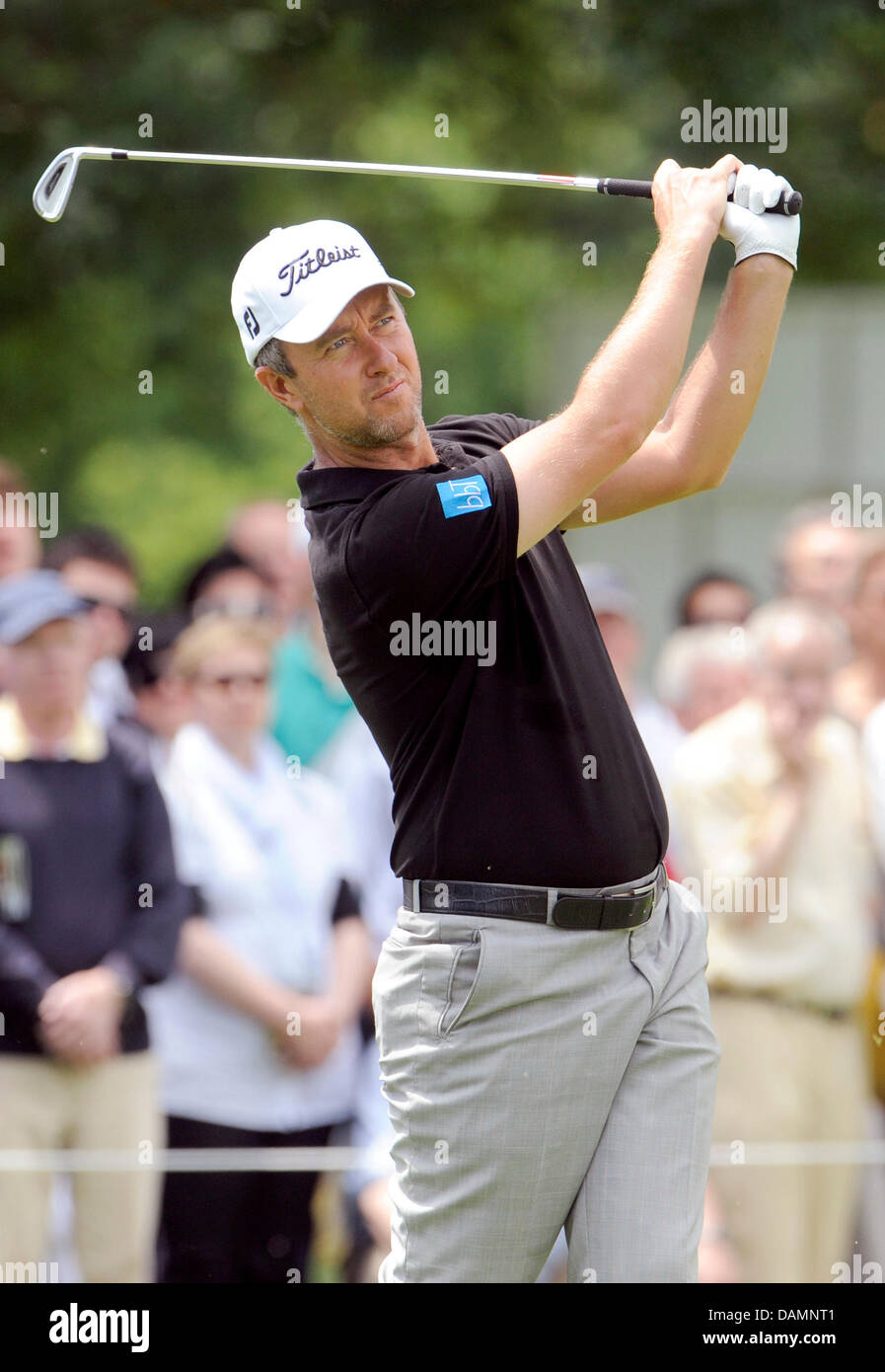 British golf pro Mark Foster drives off at the BMW Open 2011 in ...