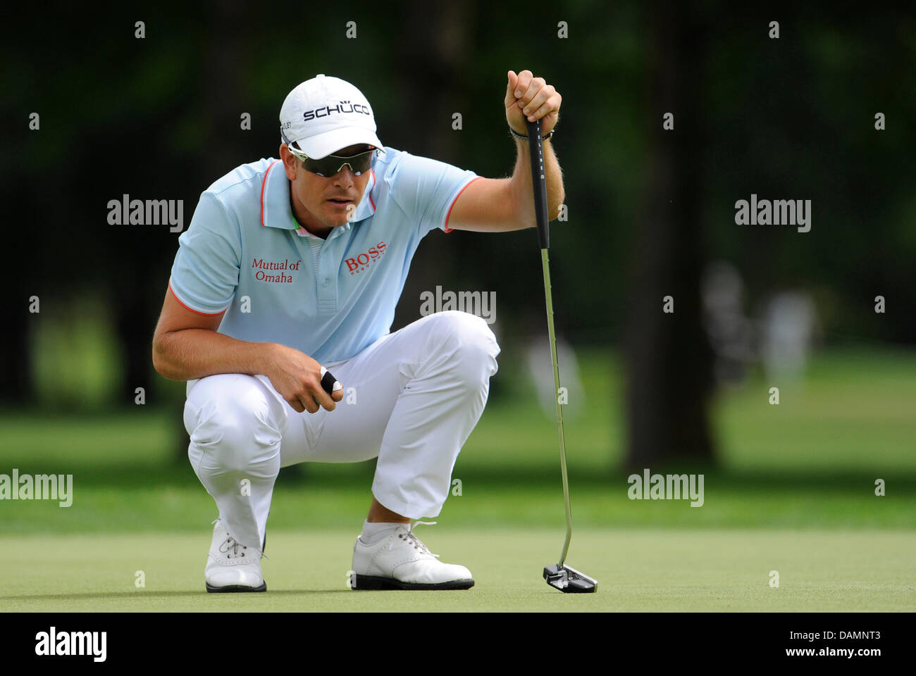 Swedish golf pro Henrik Stenson plays in the BMW Open 2011 in ...