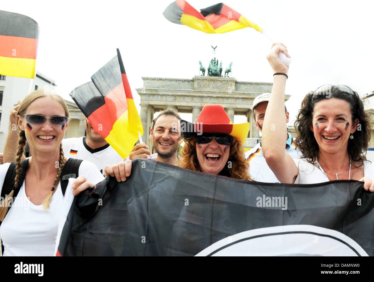 Female women's soccer fans dressed in German fan gear are on their way ...