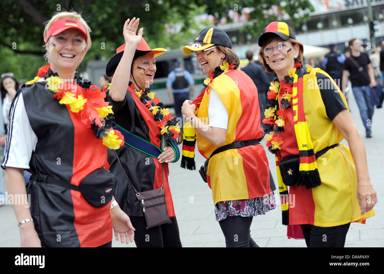 Female women's soccer fans dressed in German fan gear are on their way ...