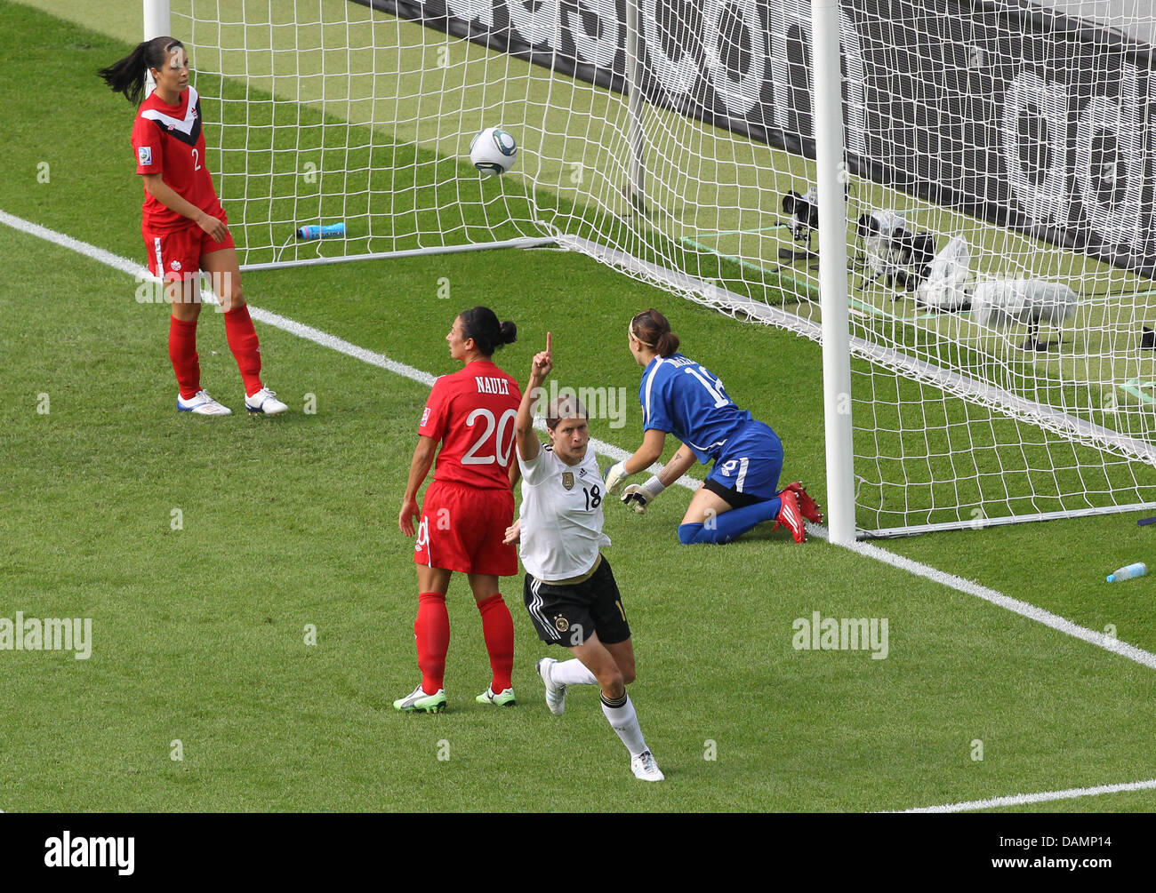 Kerstin Garefrekes (front) of Germany celebrates after scoring the 1-0 ...