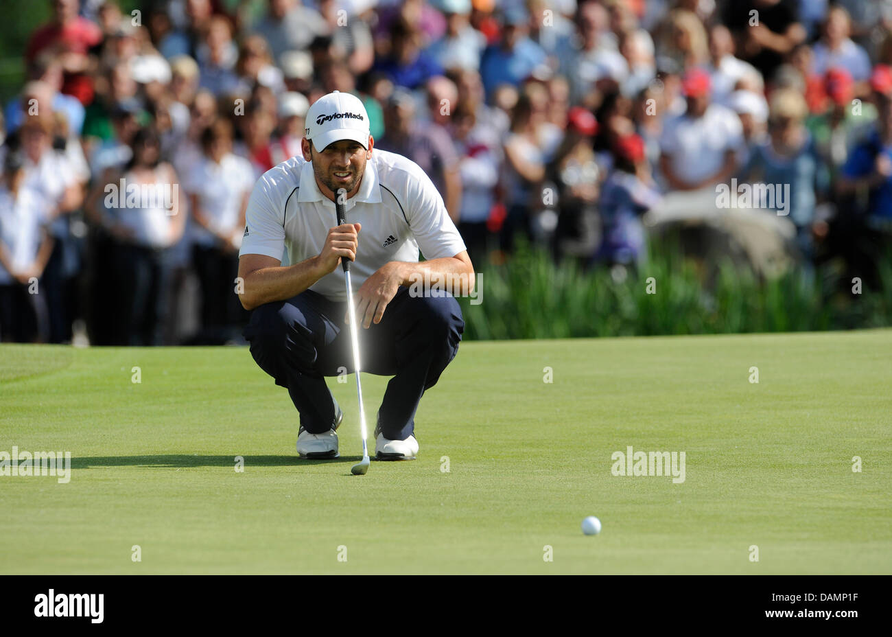 Spanish golf pro Sergio Garcia is about to putt during his loss in five ...