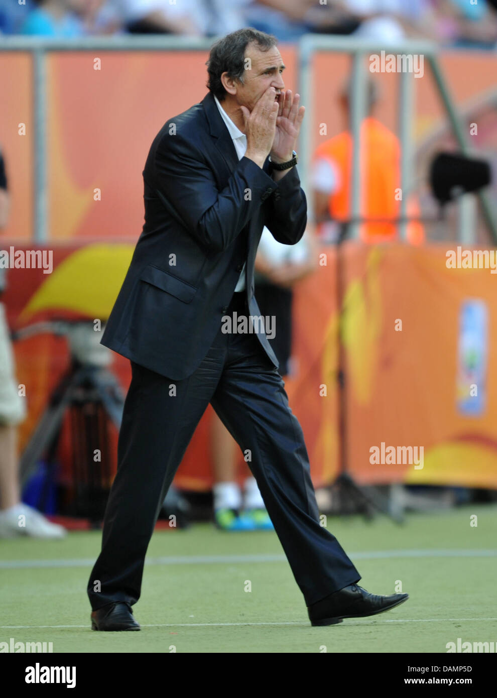 French coach Bruno Bini gestures during the Group A match Nigeria ...