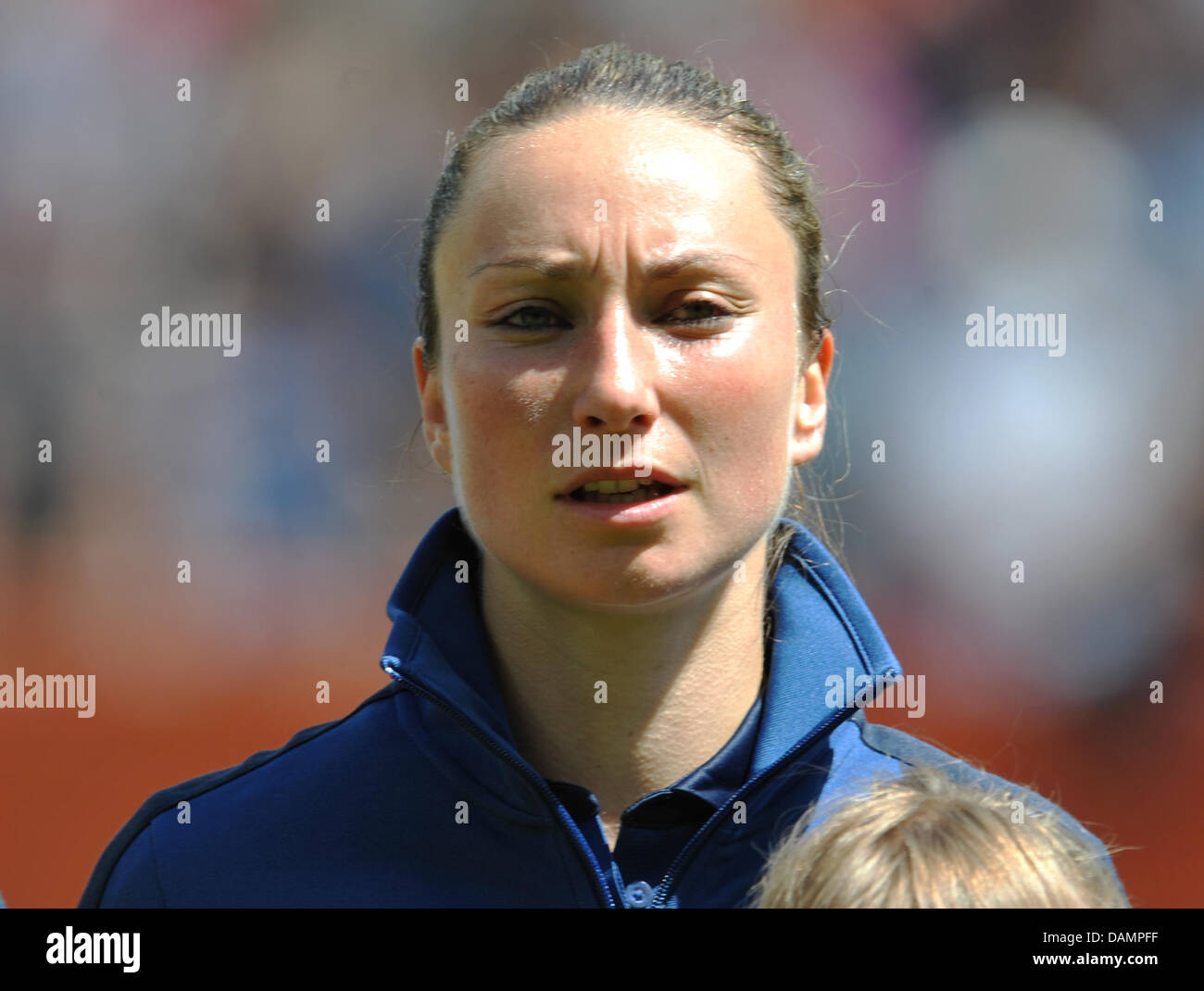 Gaetane Thiney of France sings the national anthem prior to the Group A ...