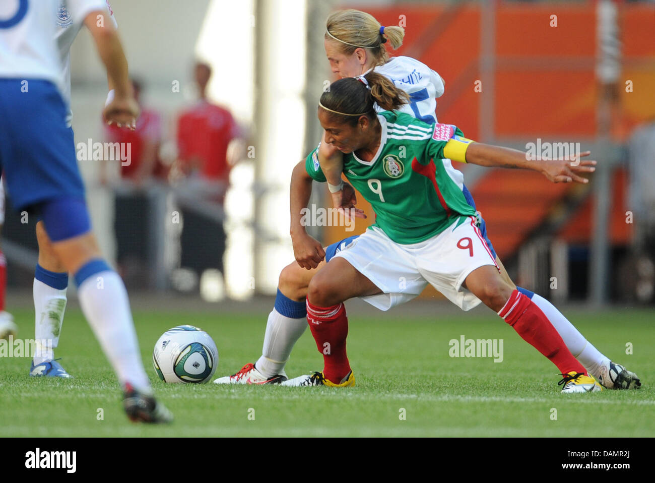 Maribel Dominguez of Mexico and Faye White (back) of England fight for ...