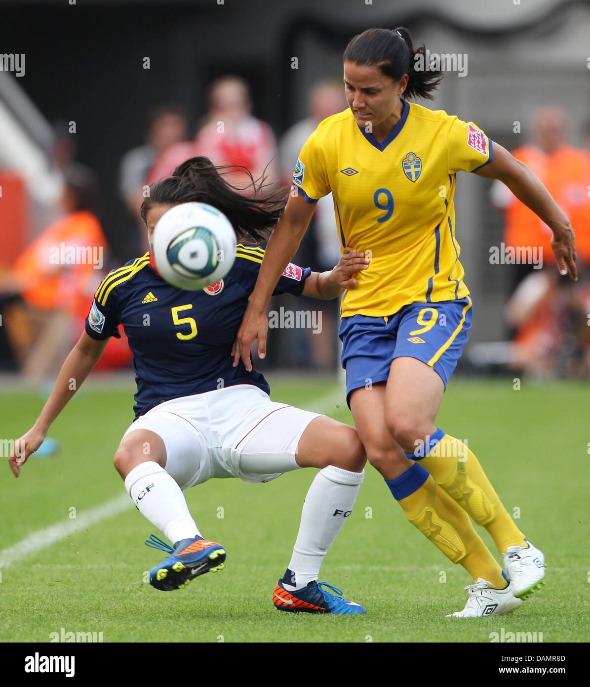 Nataly Arias (l) of Colombia and Jessica Landstrom (r) of Sweden fight ...