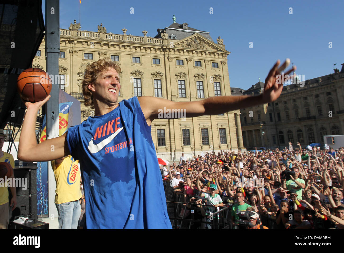 German basketball player Dirk Nowitzki throws an autographed basketball ...