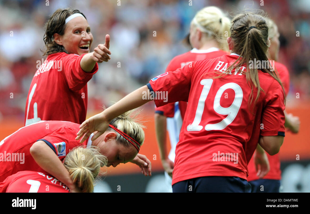 Emilie Haavi (R) of Norway celebrates her 1-0 goal with team-mates ...