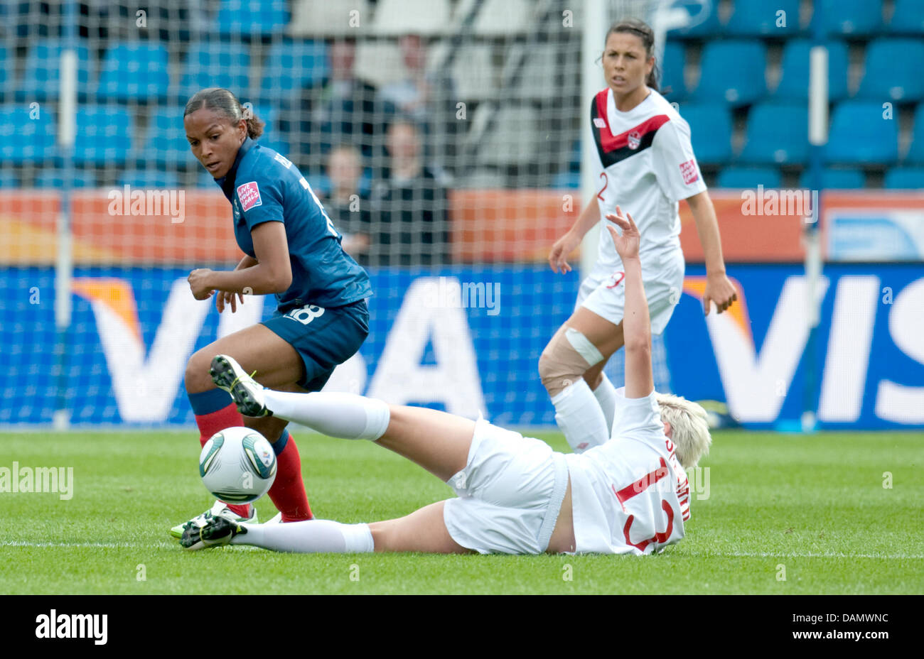 Marie-Laure Delie of France (L) and Sophie Schmidt (M) and Emily Zurrer ...