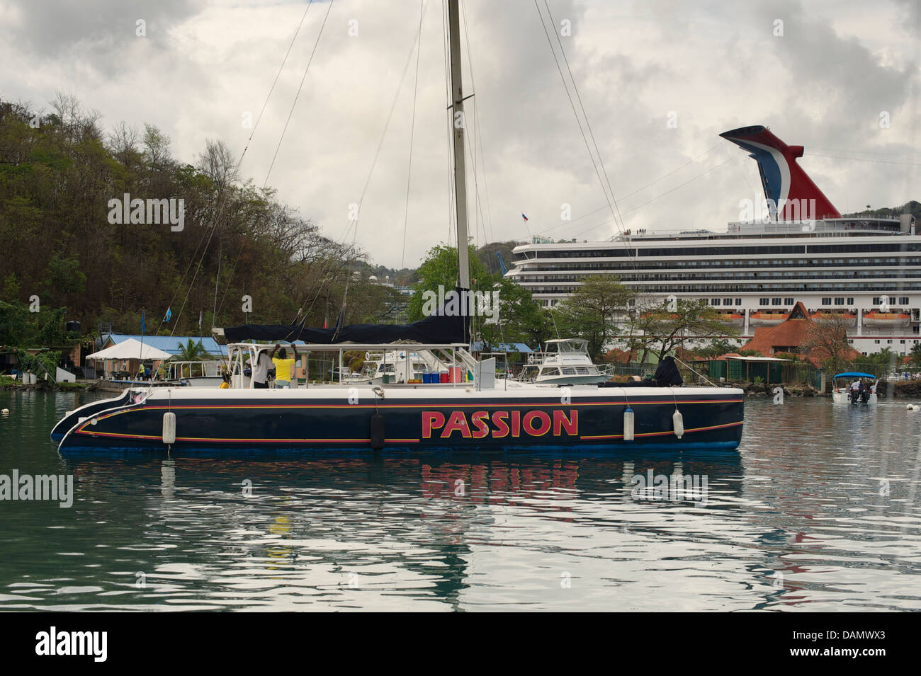 Caribbean scenes : St Lucia. Tourist boats queue for passengers from a ...