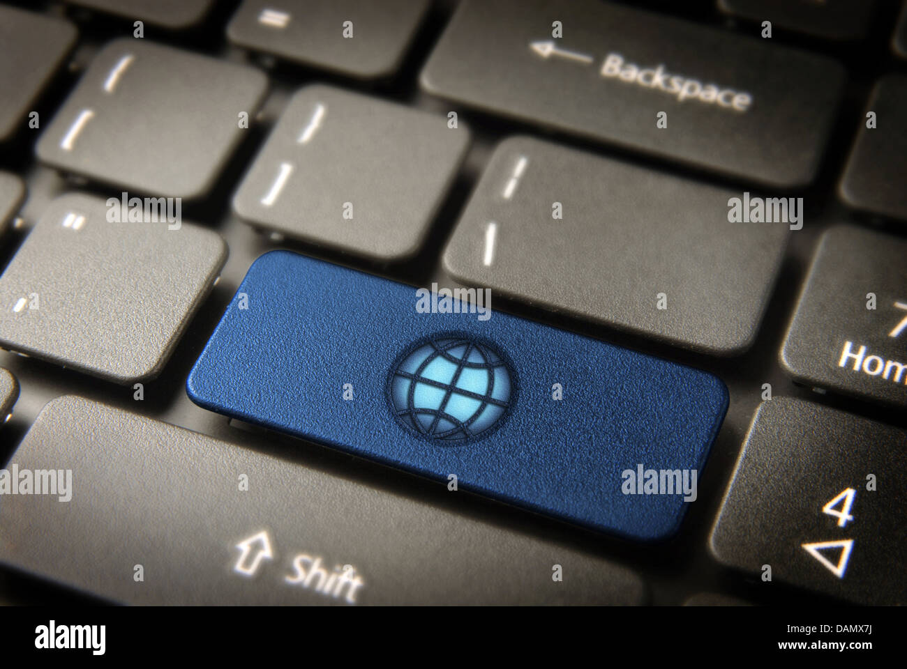 Internet key with Global icon on laptop keyboard. Included clipping ...