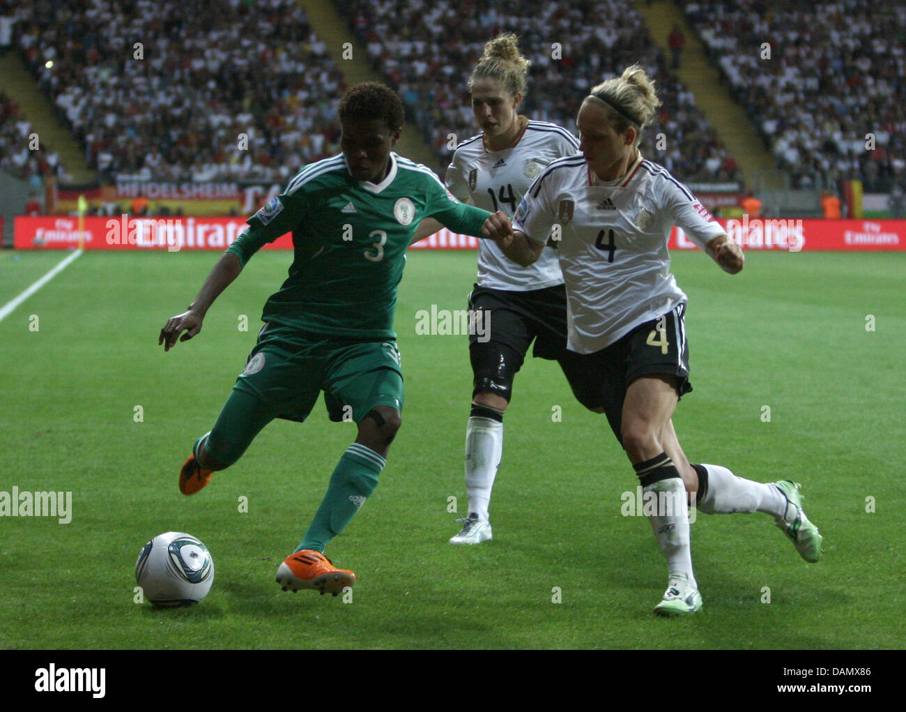 Babett Peter (r) and Kim Kulig of Germany and Osinachi Ohale of Nigeria ...