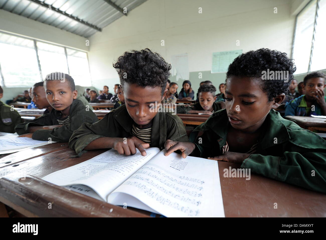 Children sit inside their classroom at a school in Dim Dim, Ethiopia ...