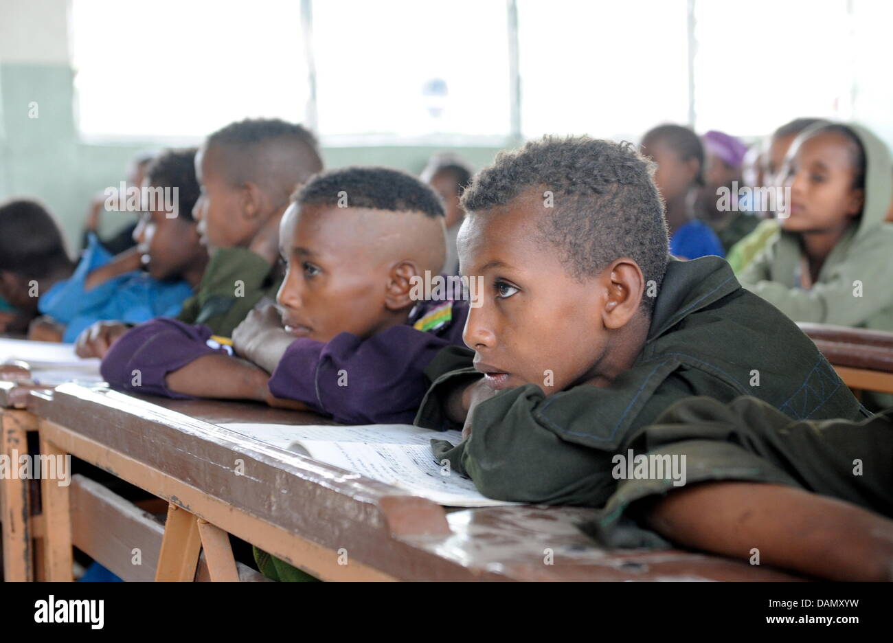 Children sit inside their classroom at a school in Dim Dim, Ethiopia ...
