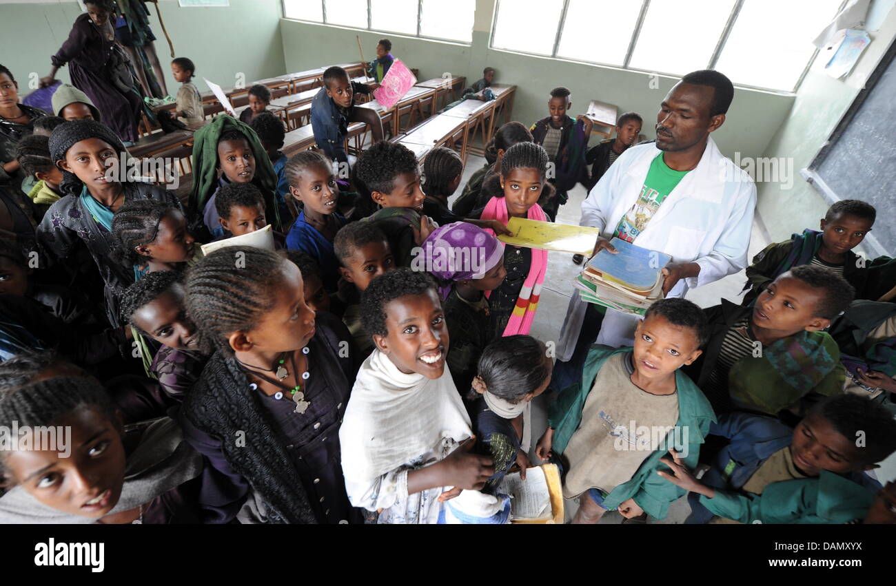 Children sit inside their classroom at a school in Dim Dim, Ethiopia ...