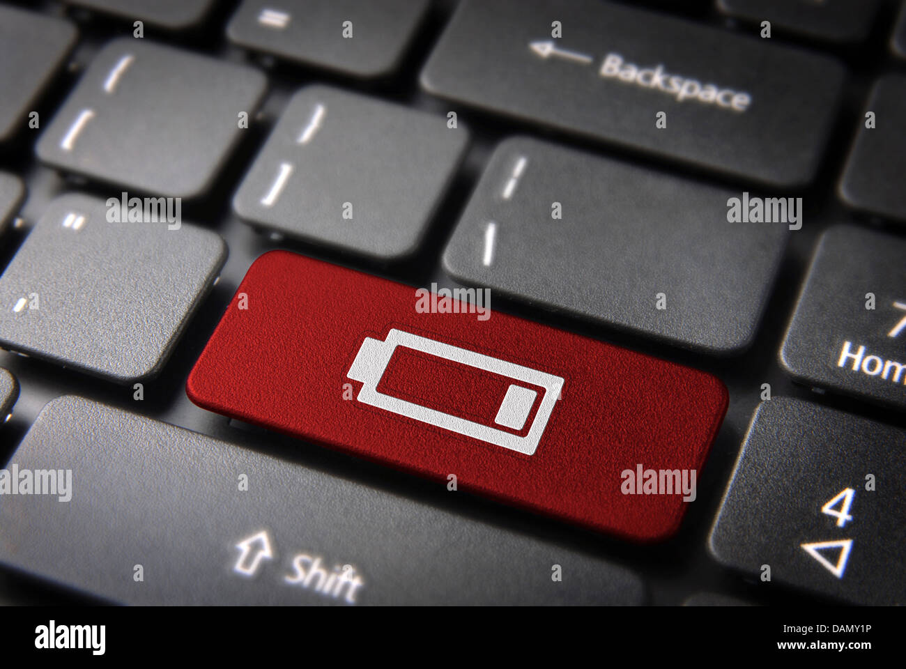 Technology key with low battery icon on laptop keyboard. Included ...