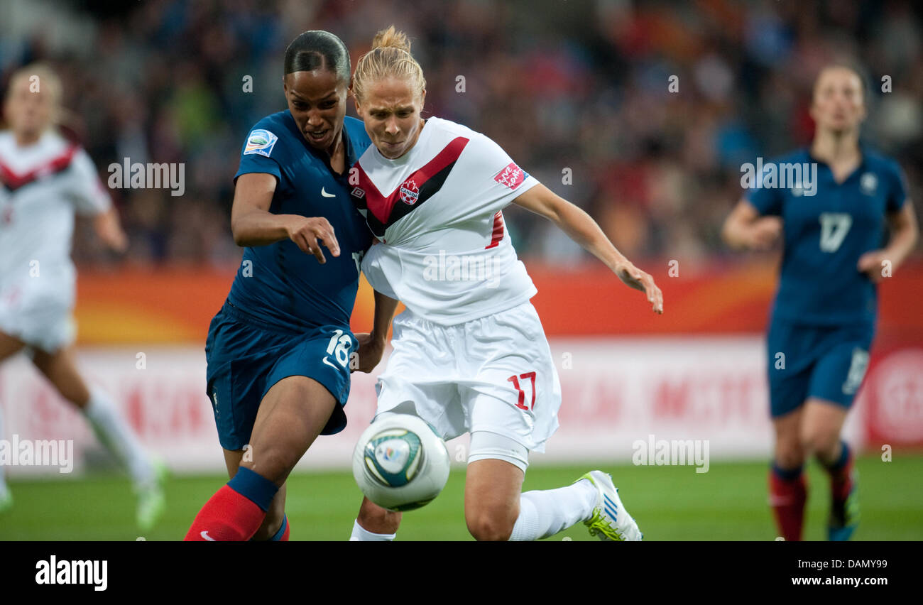 Marie-Laure Delie of France (L) and Brittany Timko of Canada fight for ...
