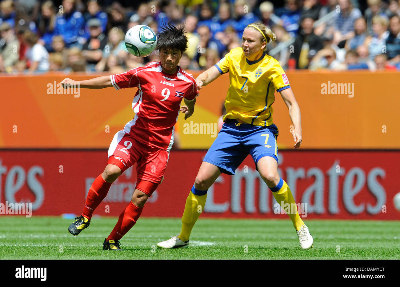 Ra Un Sim (l) of North Korea and Sara Larsson of Sweden fight for the ...