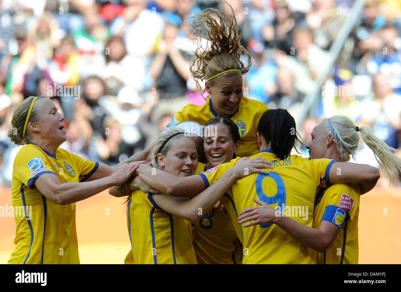 Lisa Dahlkvist (2-L) of Sweden celebrates with her team-mates after ...