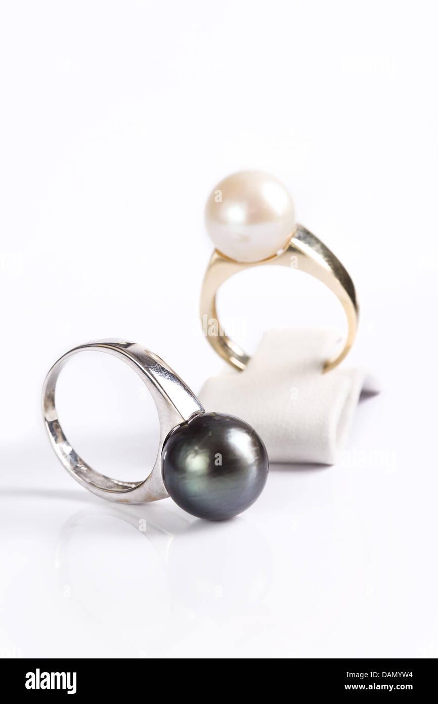 Two rings with pearls isolated Stock Photo - Alamy